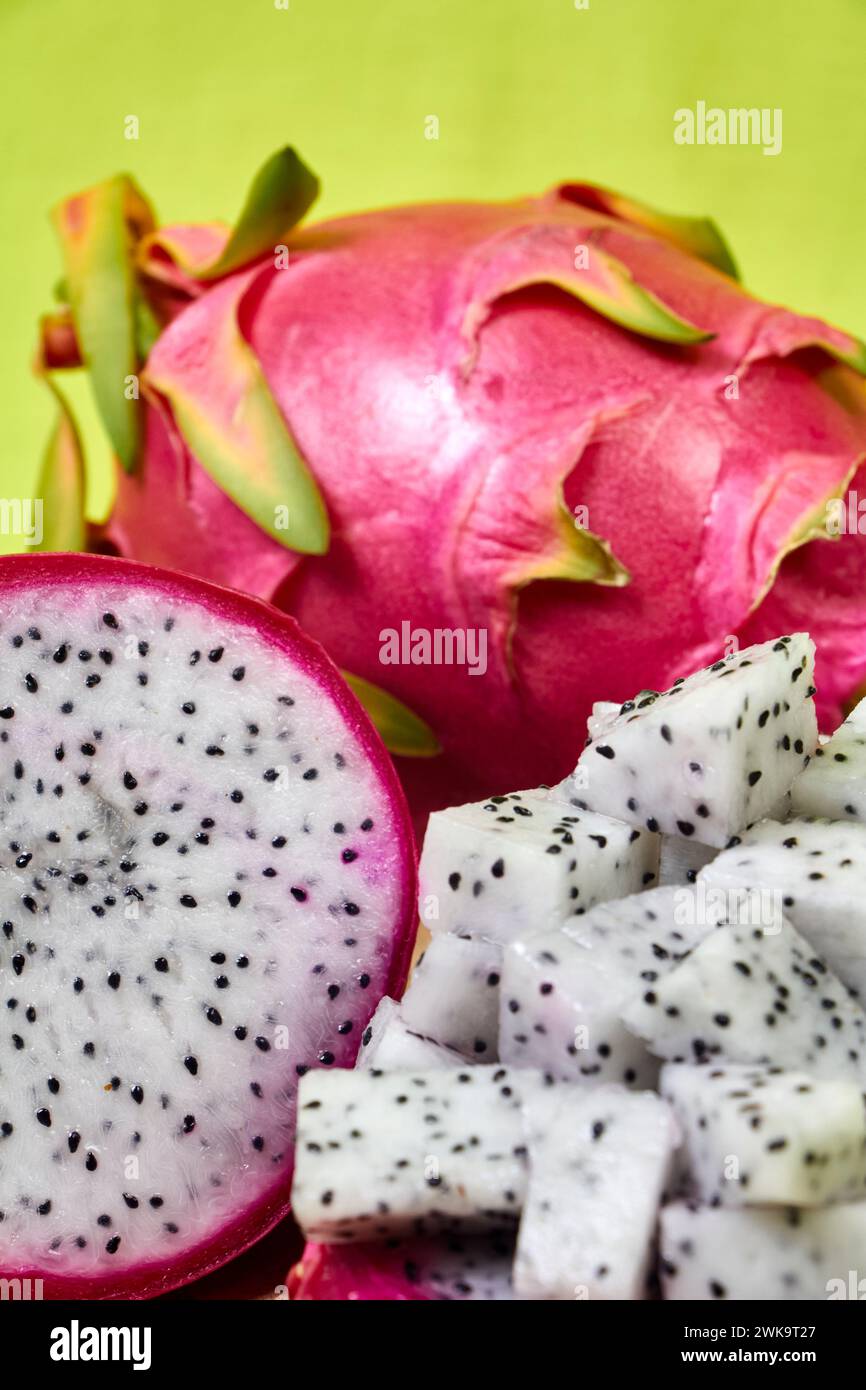 Red dragon fruit Set with appetizing serving on green background. Top ...