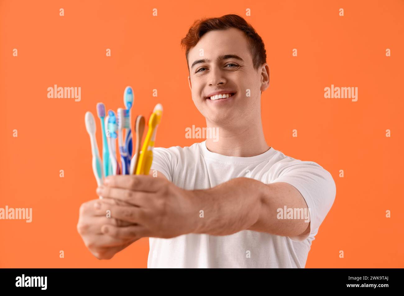 Handsome guy brushes teeth hi-res stock photography and images - Alamy