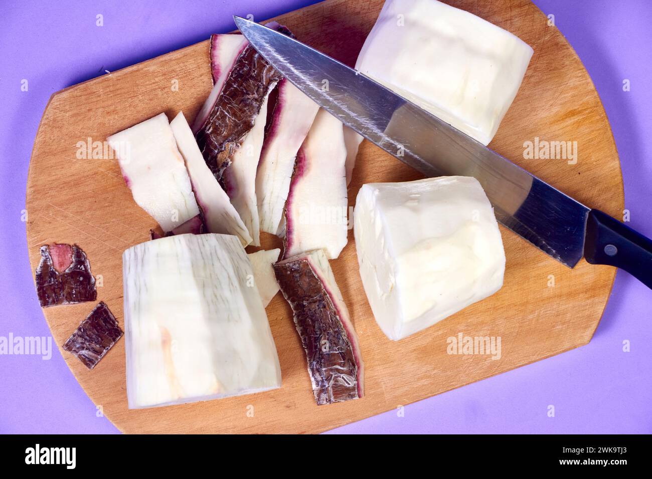 Fresh Organic Cassava Root, Manioc Esculenta, yuca On purple Background ...