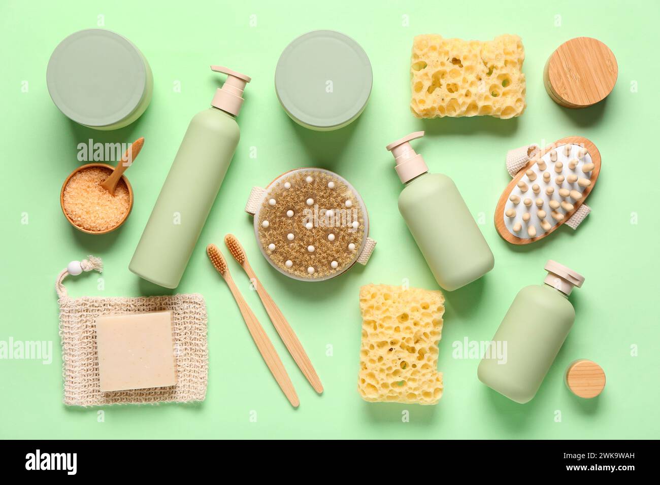 Set of bath supplies on green background Stock Photo - Alamy