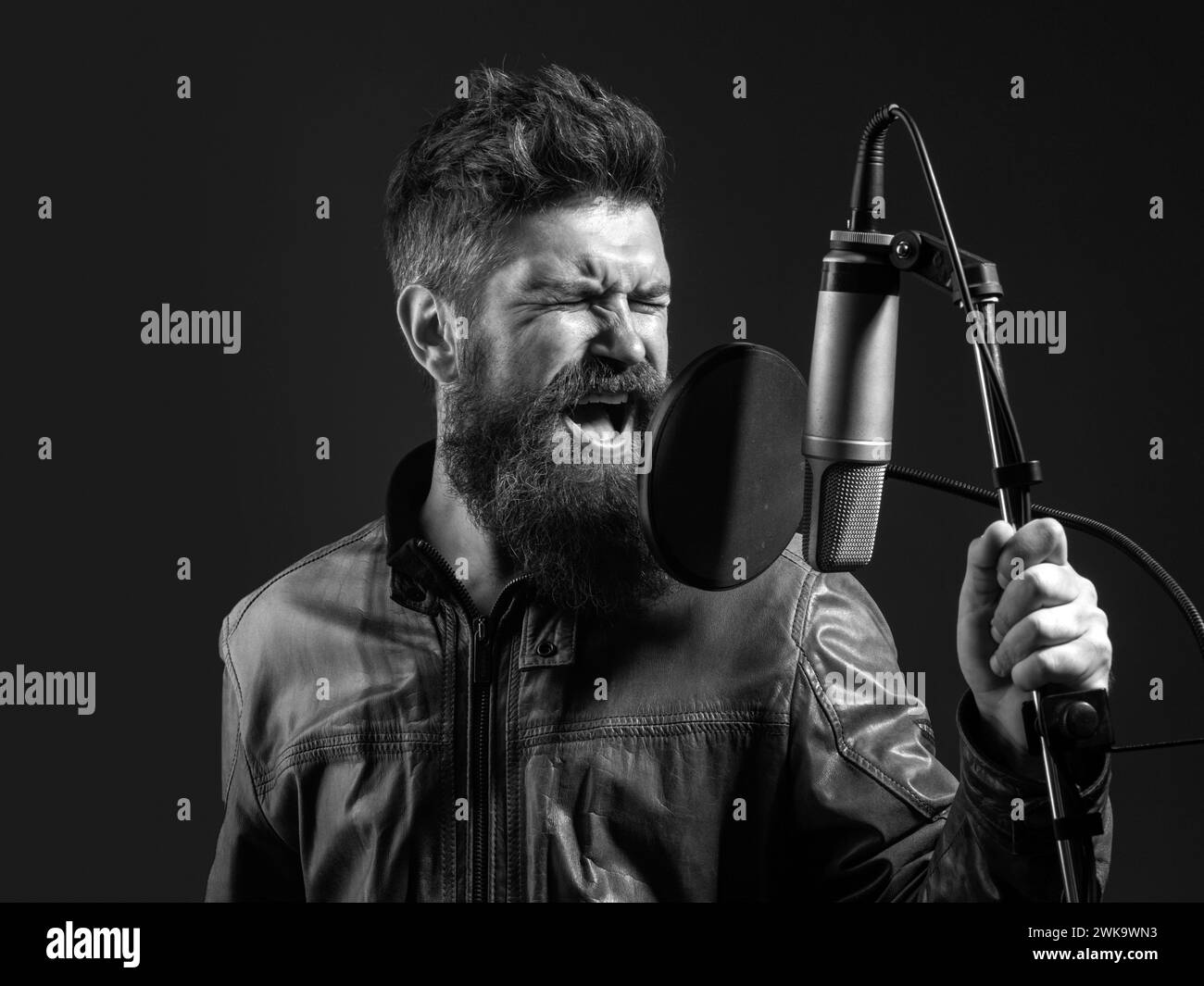 Man singing in recording studio Black and White Stock Photos & Images ...