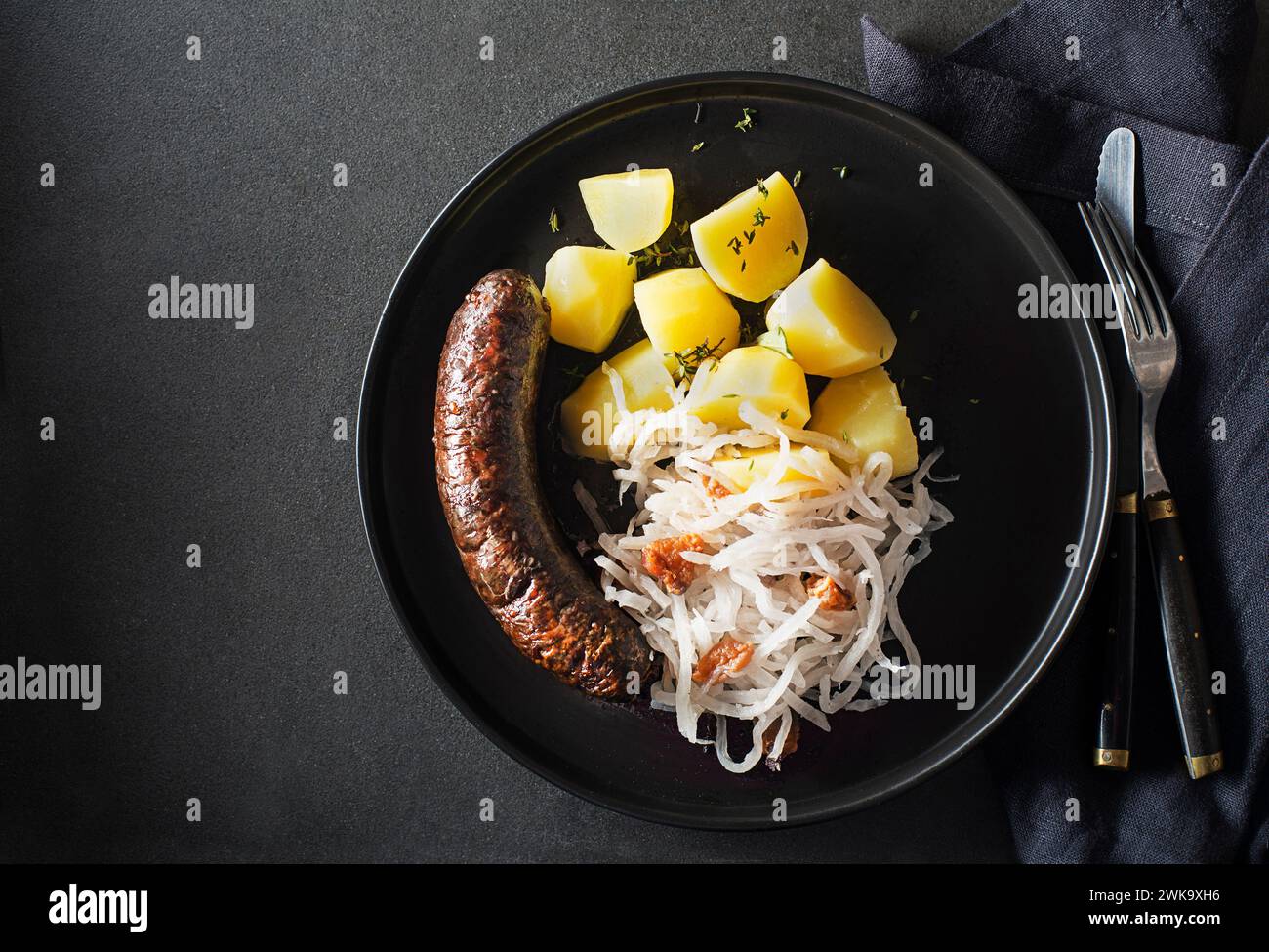 Bloody sausage morcilla, stewed sour turnip and mashed potato with ...