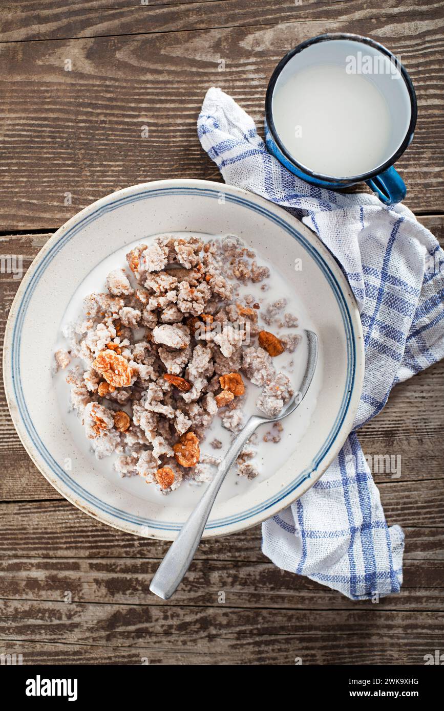 Slovenian traditional dish buckwheat mush served with pan-fried pork ...