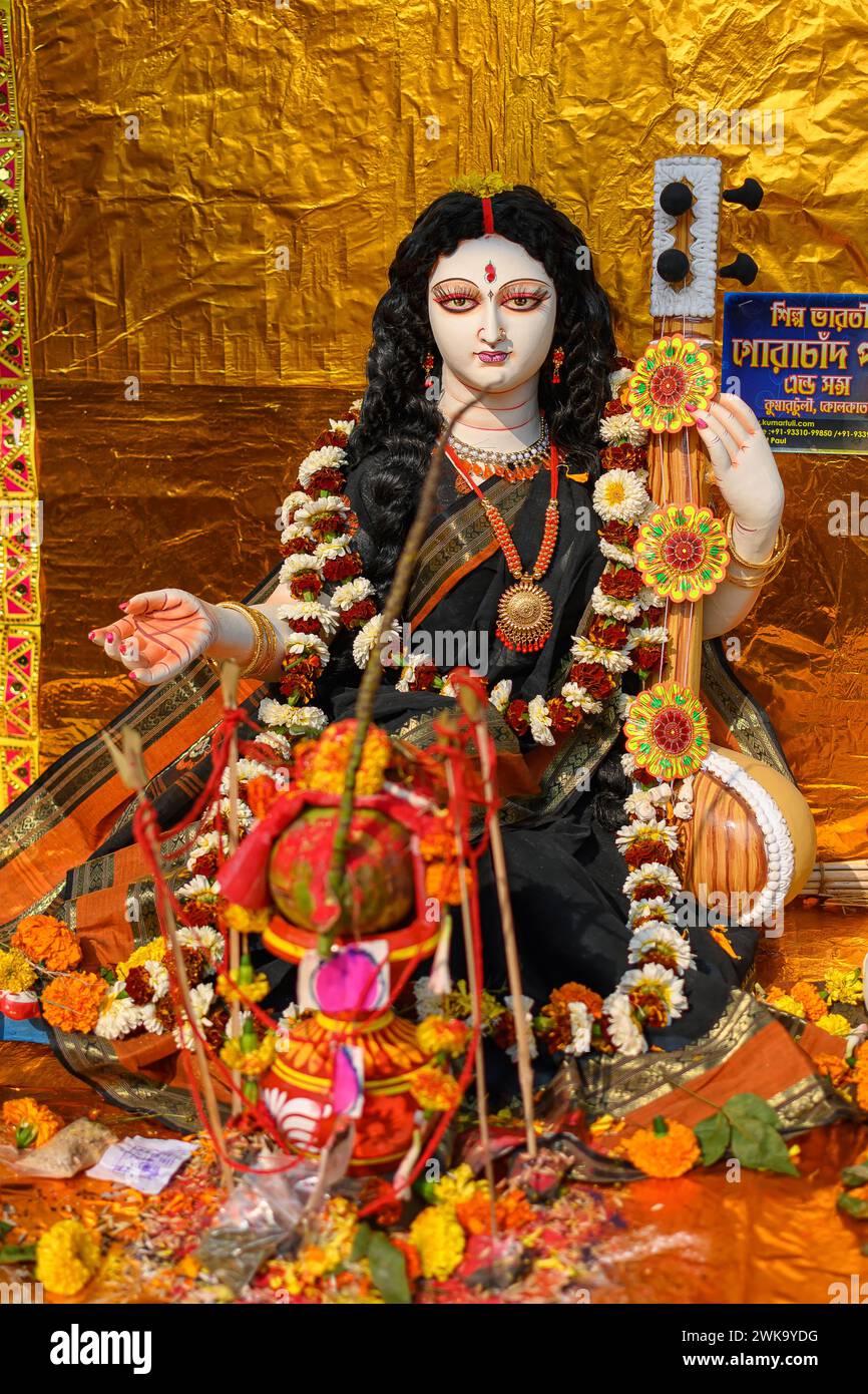 Idol of Goddess Devi Saraswati at a decorated puja pandal in Kolkata ...