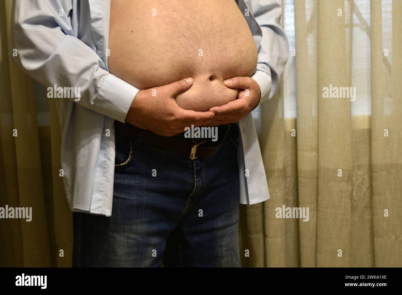 Big belly man hi-res stock photography and images - Alamy