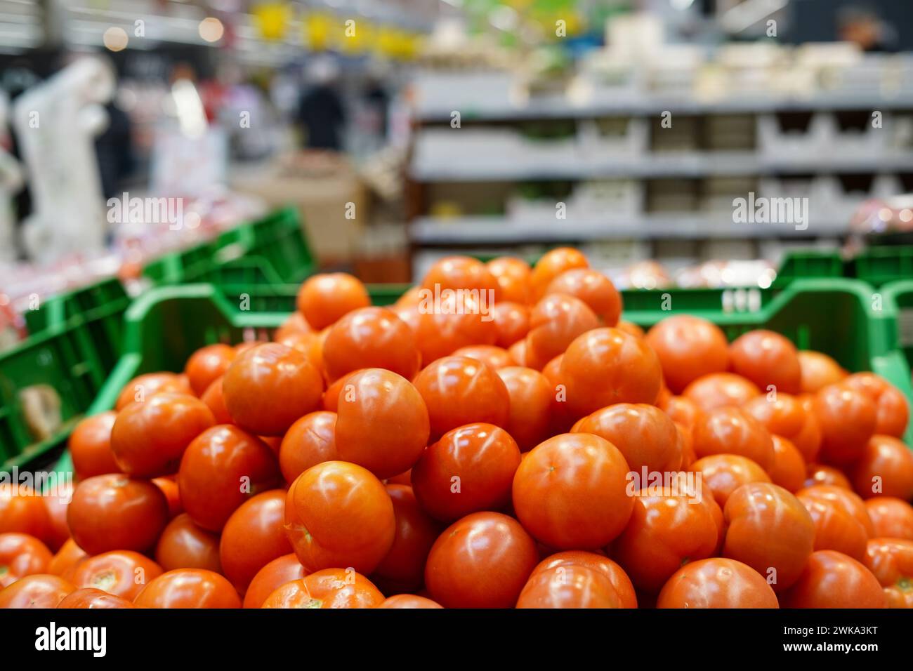 Ripe red tomatoes placed in the boxes in grocery store Stock Photo - Alamy