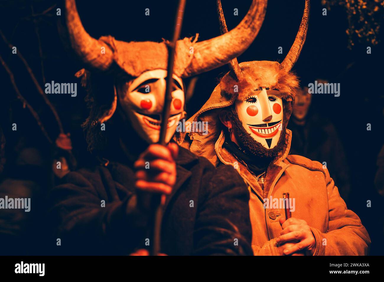 The Felos (carnival revellers of Maceda) wearing wooden masks and horns ...