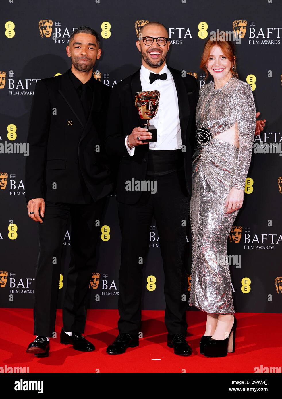 Cord Jefferson (centre) poses for a photo in the press room with ...