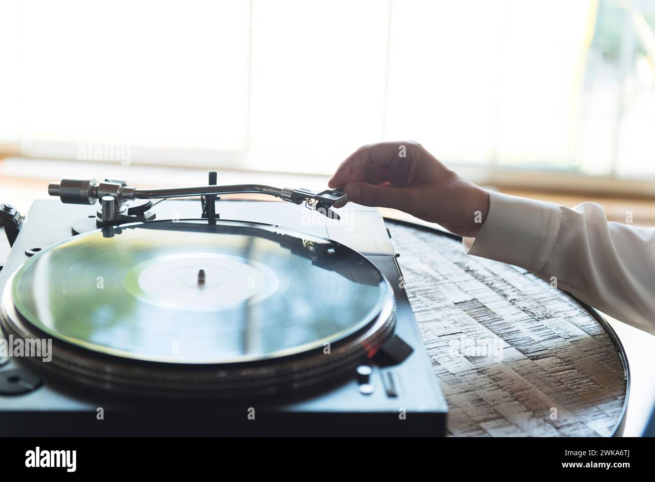 playing vinyl on a record player Stock Photo - Alamy