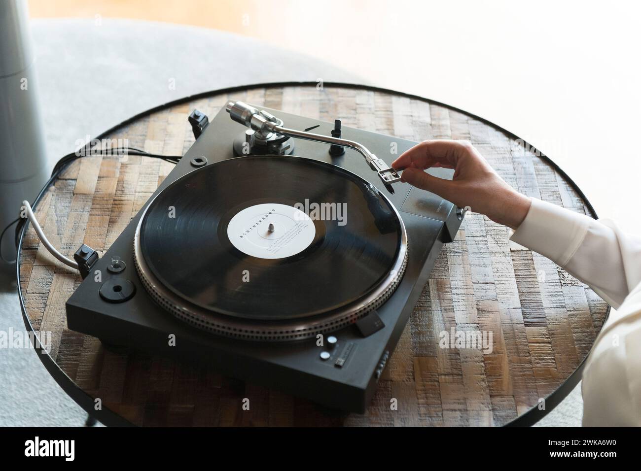 playing vinyl on a record player Stock Photo - Alamy