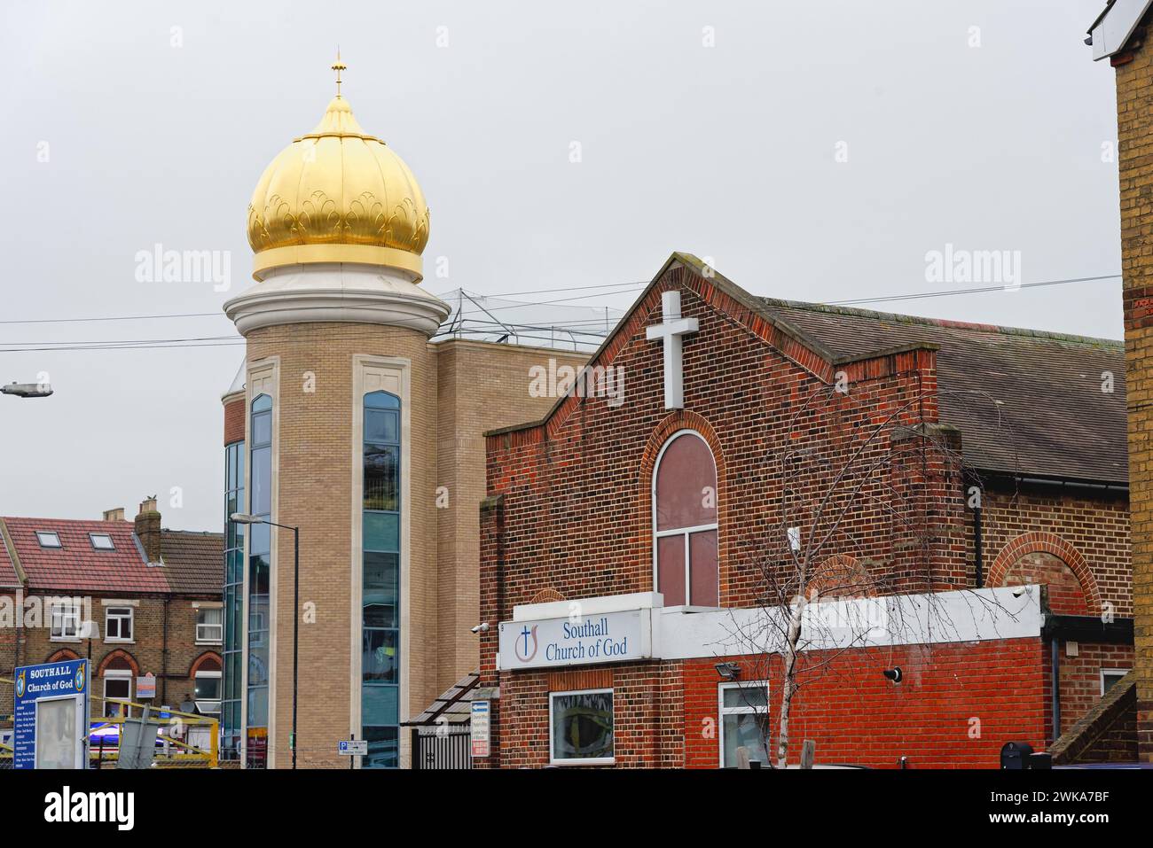 The Golden Dome of the Gurdwara Guru Nanak Darbar Sikh Temple next to ...