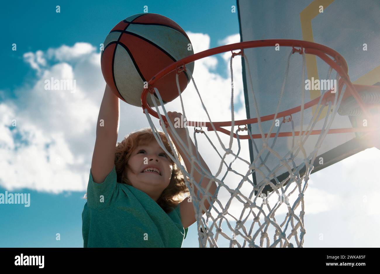 Kids playing basketball. Child sport activity. Healthy children ...