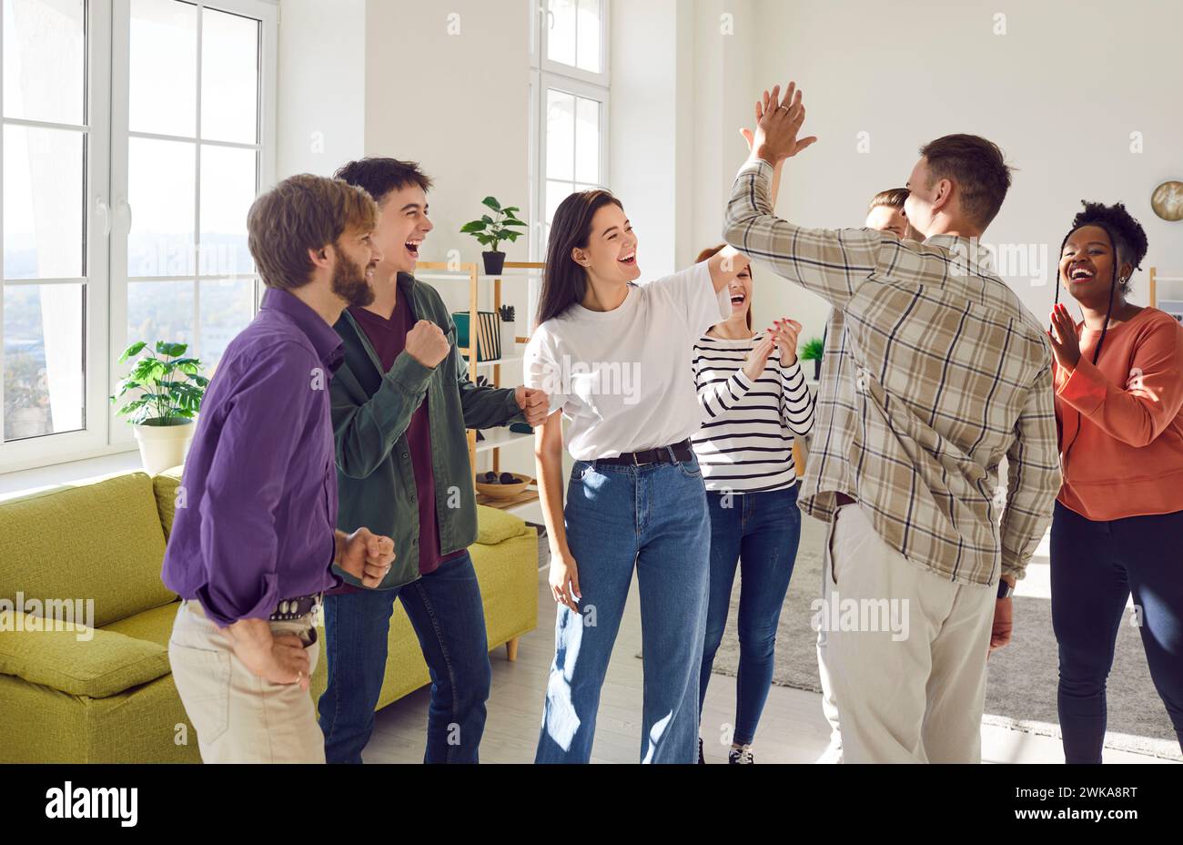 Group positive international friends sitting hi-res stock photography ...