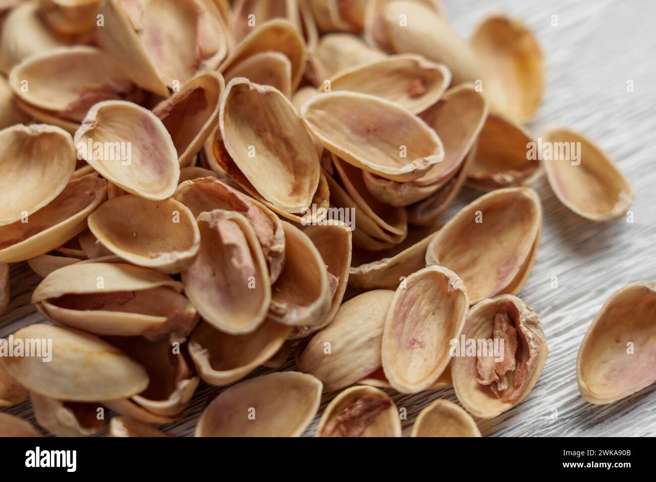 Pistachio nut shells closeup. Sorting garbage and kitchen scraps ...
