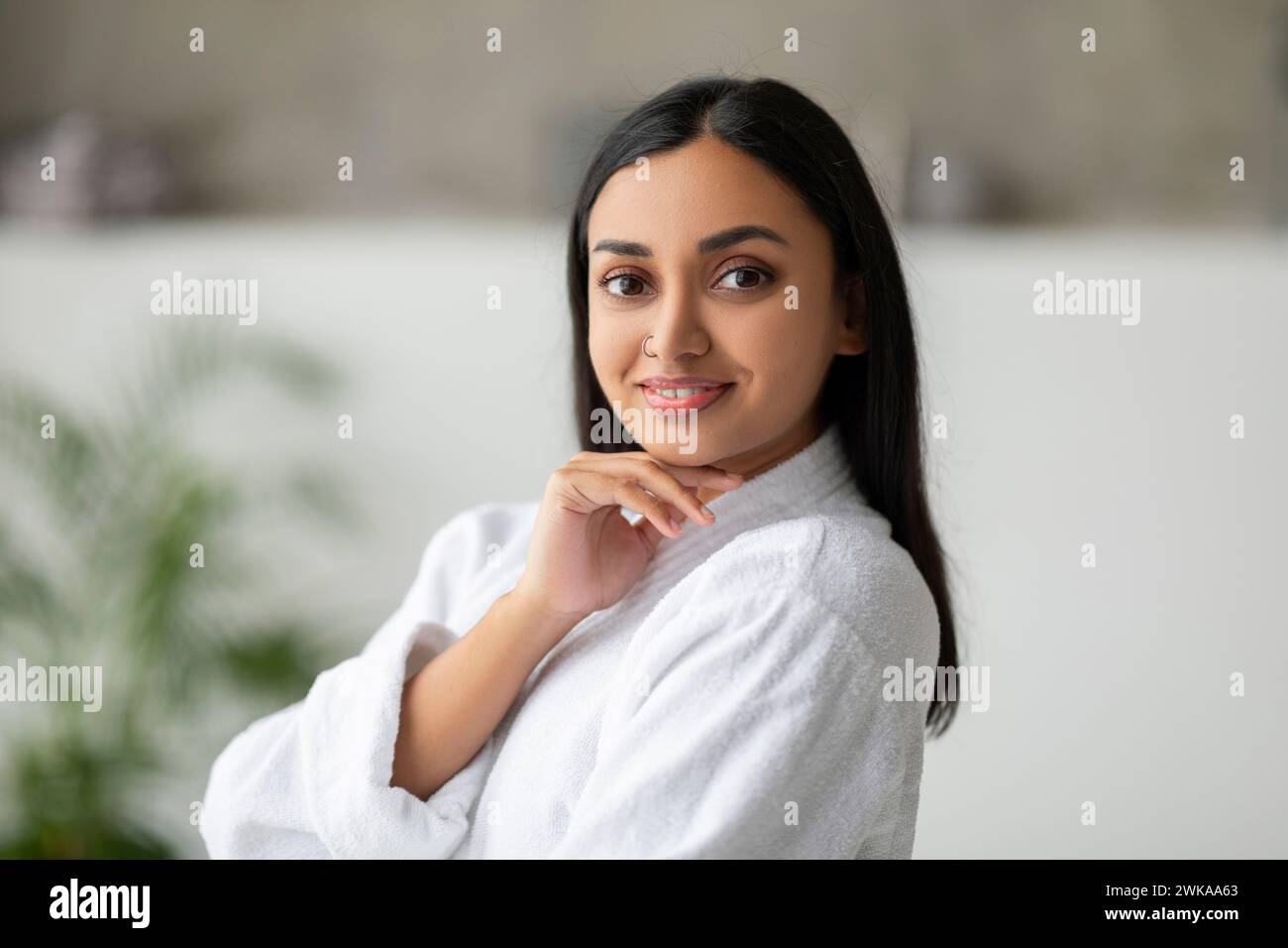 Portrait of beautiful eastern lady enjoying spa day at home Stock Photo ...