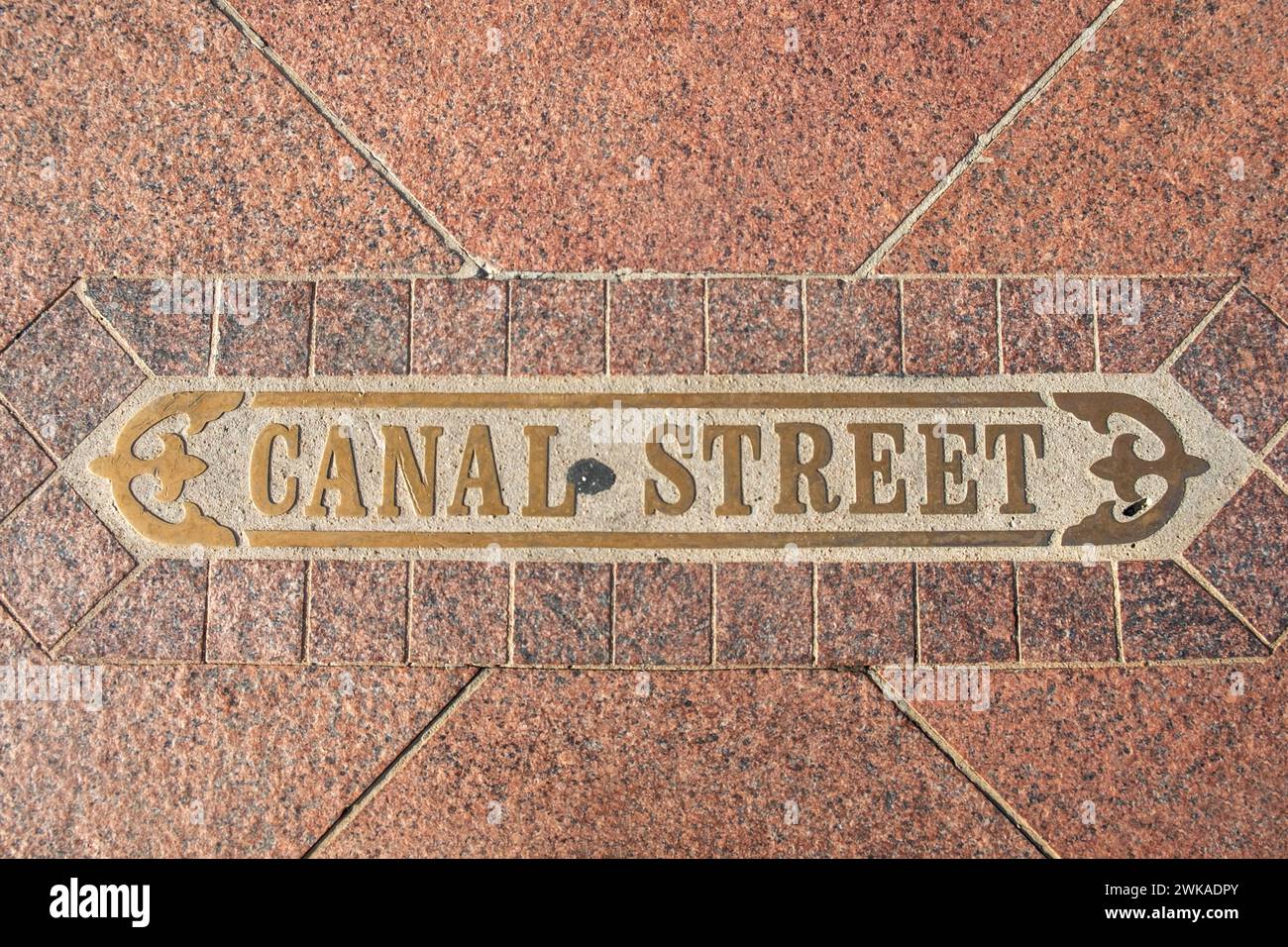 brass inlet Canal street in New Orleans at the sidewalk of Canal street ...