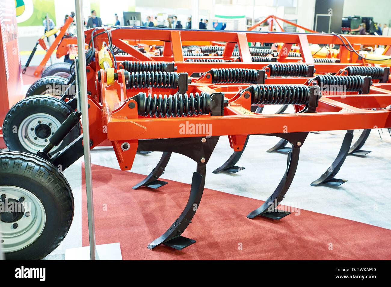 Universal row crop cultivator with spring struts at the agricultural ...