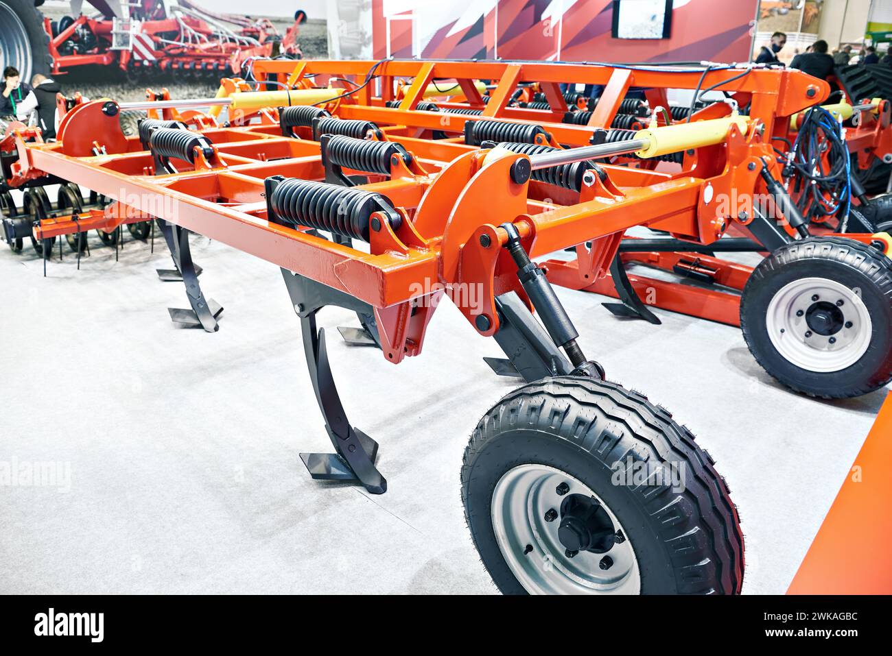 Universal row crop cultivator with spring struts at the agricultural ...
