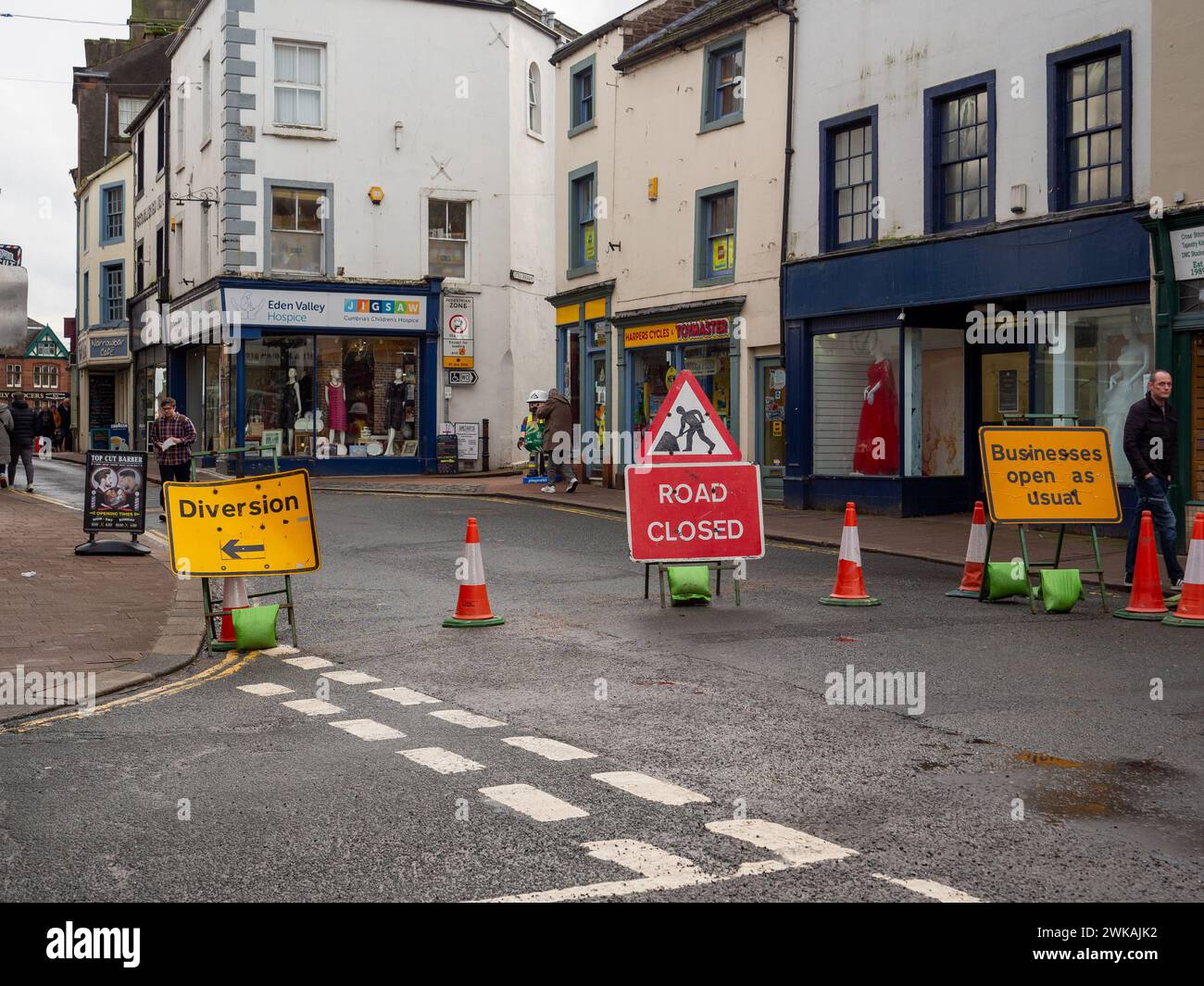 Various signs and barriers indicating the Partial temporary closure of ...