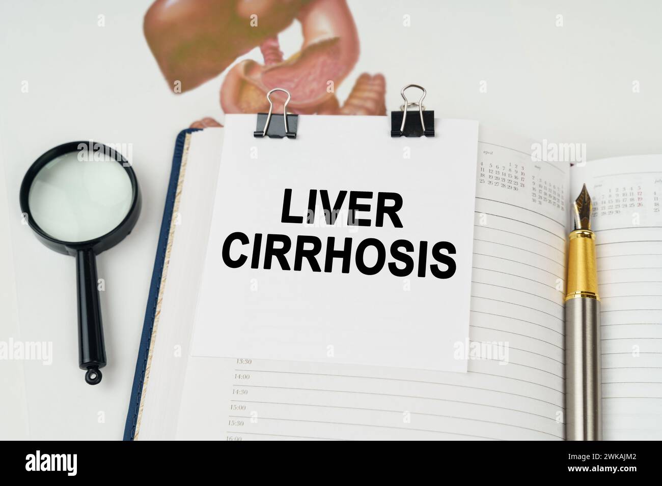 Medical concept. On the table there is a magnifying glass and a notepad ...