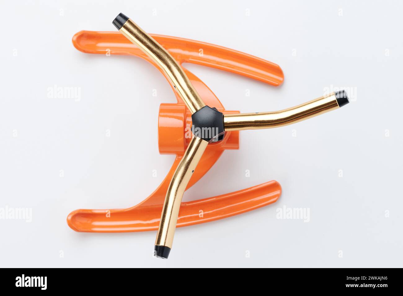 Metal grass water sprinkler above top view isolated Stock Photo - Alamy