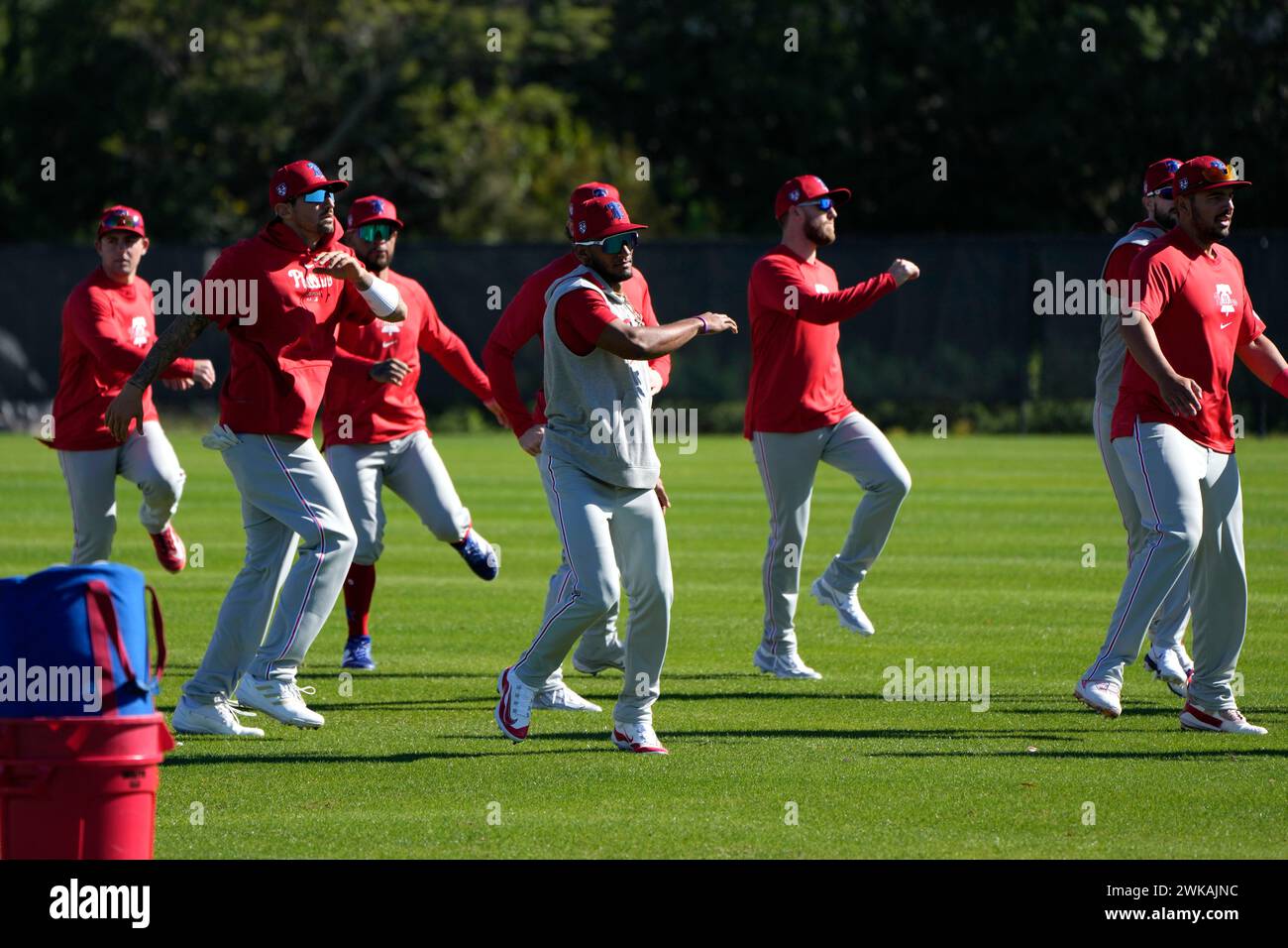 Philadelphia Phillies players run in the outfield during a baseball ...