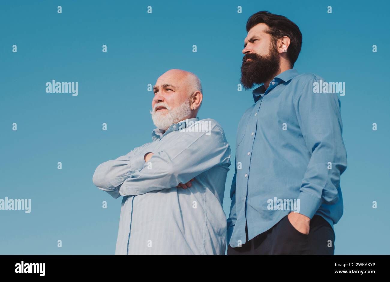 Elderly Senior man and bearded son - two generation concept. Generation ...