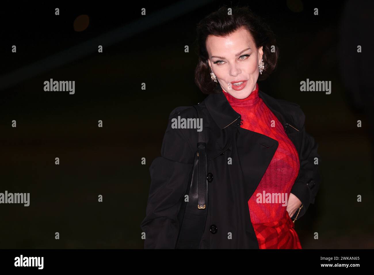 Debi Mazar poses for photographers upon arrival at the Burberry Winter ...