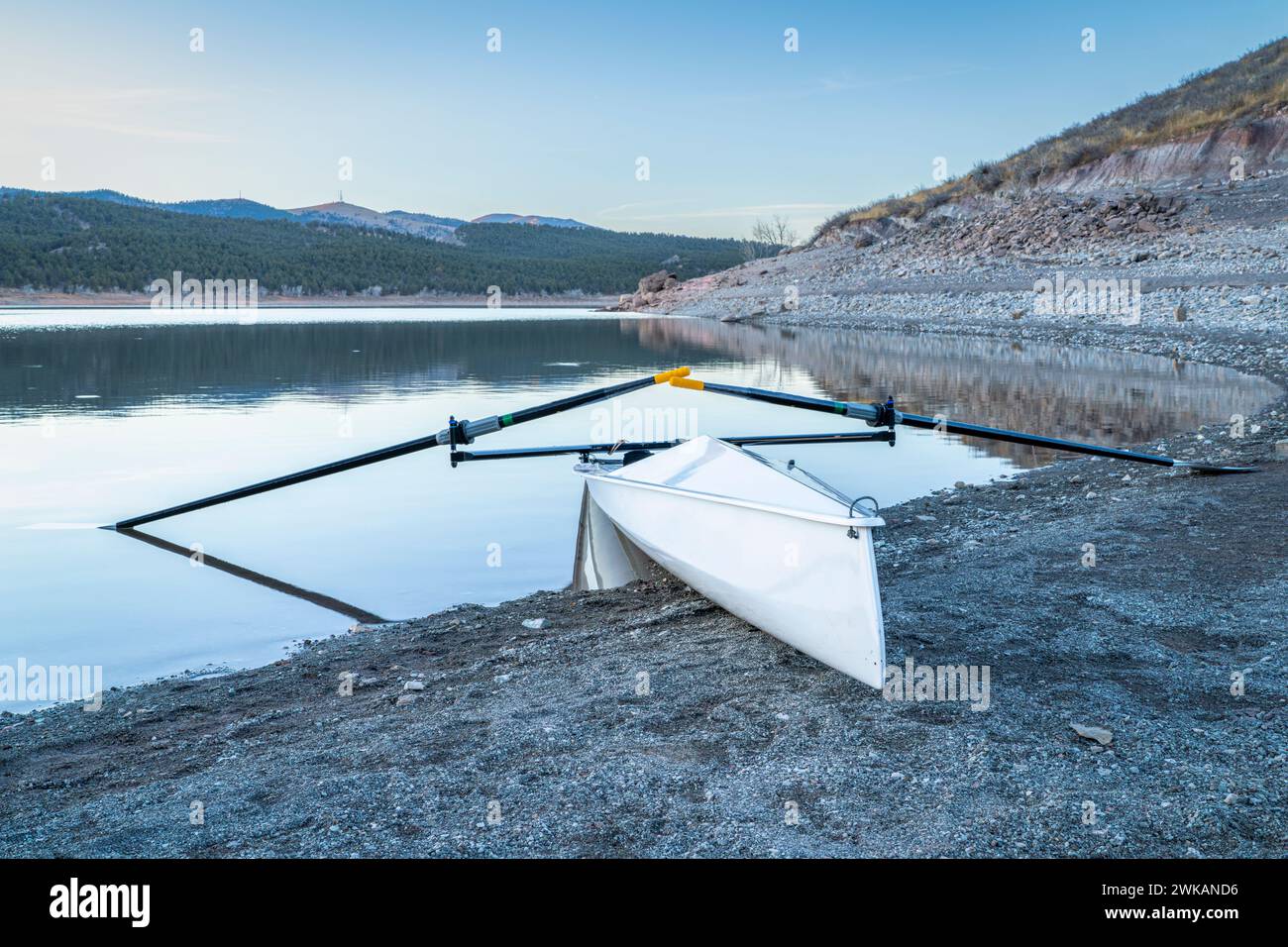 Coastal rowing shell on a shore of Carter Lake in northern Colorado at ...