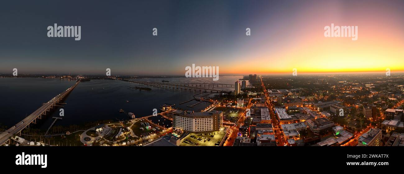 Aerial view of city lights at sunset Stock Photo - Alamy