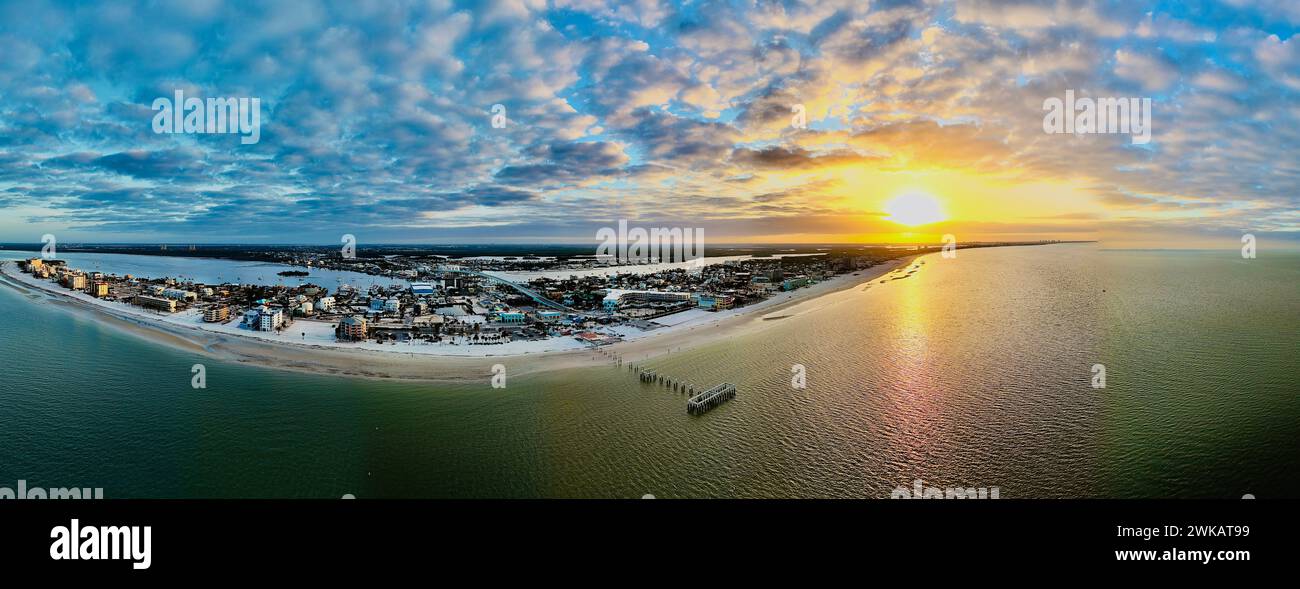Aerial view of sunrise on beach over ocean Stock Photo - Alamy