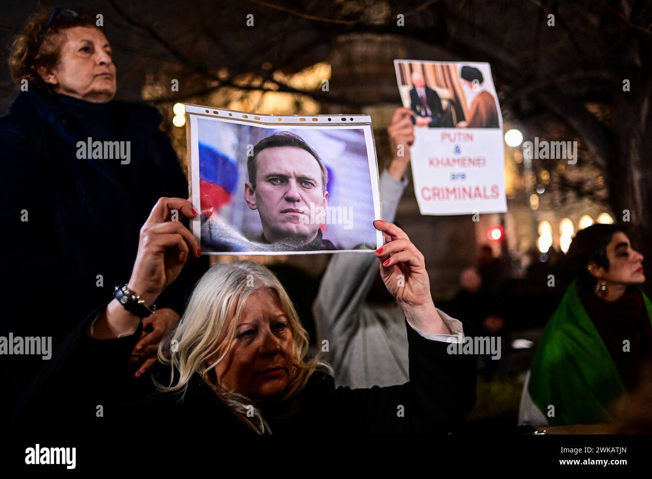 Milan, Italy - February 19, 2024: A woman holds a photo depicting ...