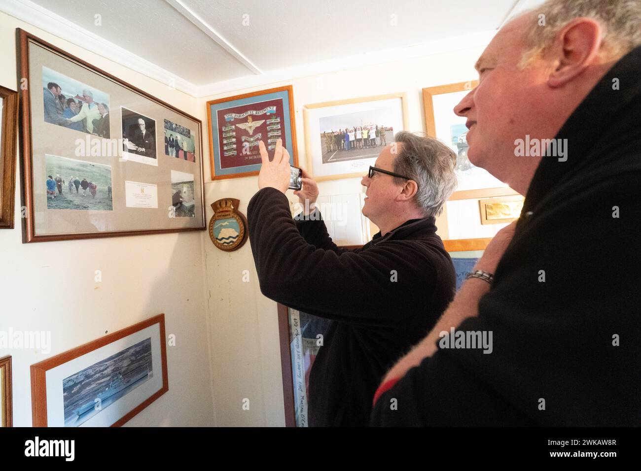 Foreign Secretary Lord David Cameron takes a photograph of a photograph ...