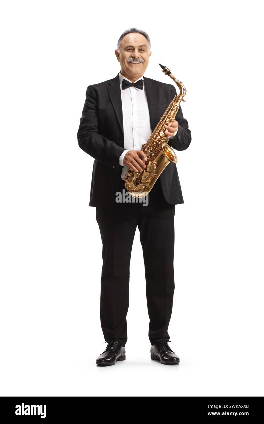 Full length portrait of a mature musician holding a sax and smiling ...