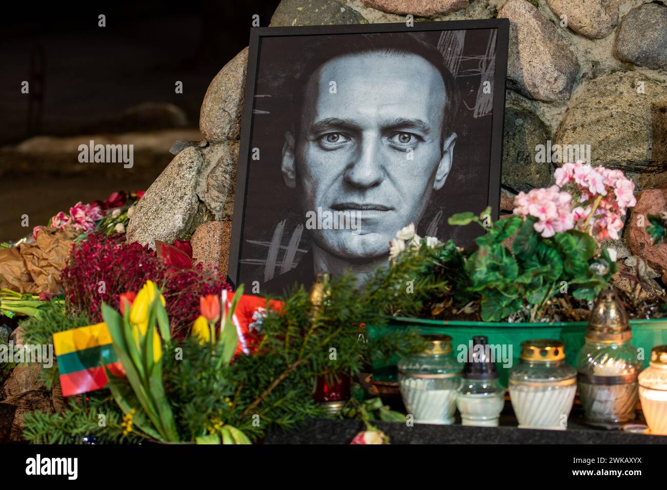 Flowers and candles laid at spontaneous memorial for Russian opposition ...