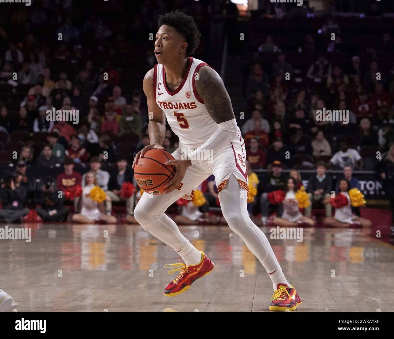 USC Trojans guard Boogie Ellis (5) makes a move with the basketball ...