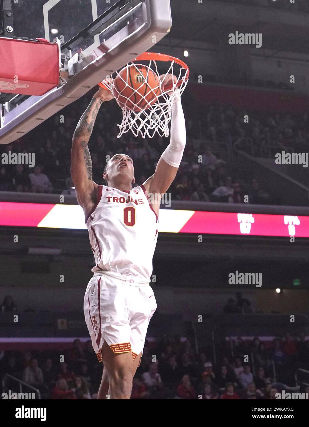 USC Trojans guard Kobe Johnson (0) makes a move with the basketball ...