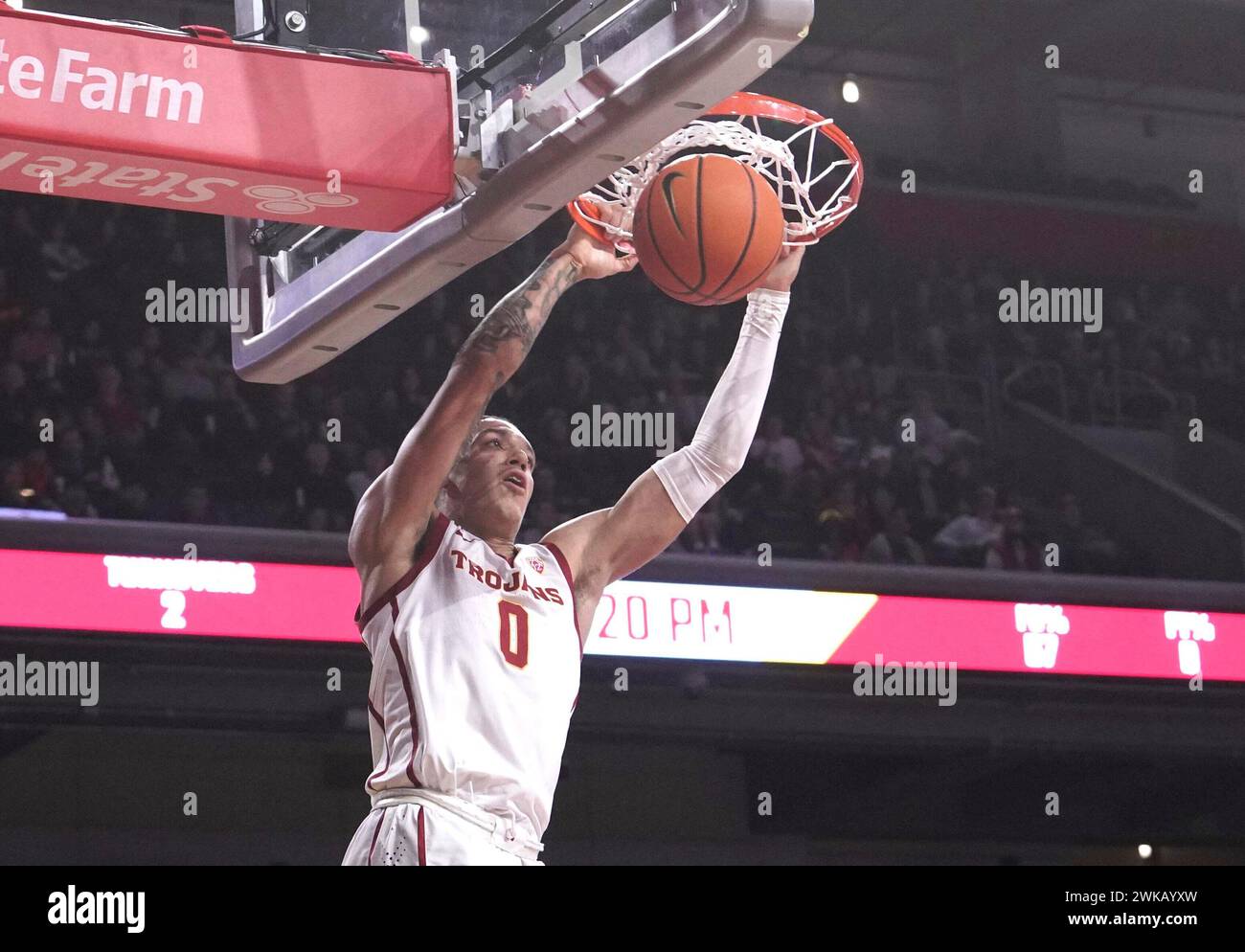 USC Trojans guard Kobe Johnson (0) makes a move with the basketball ...