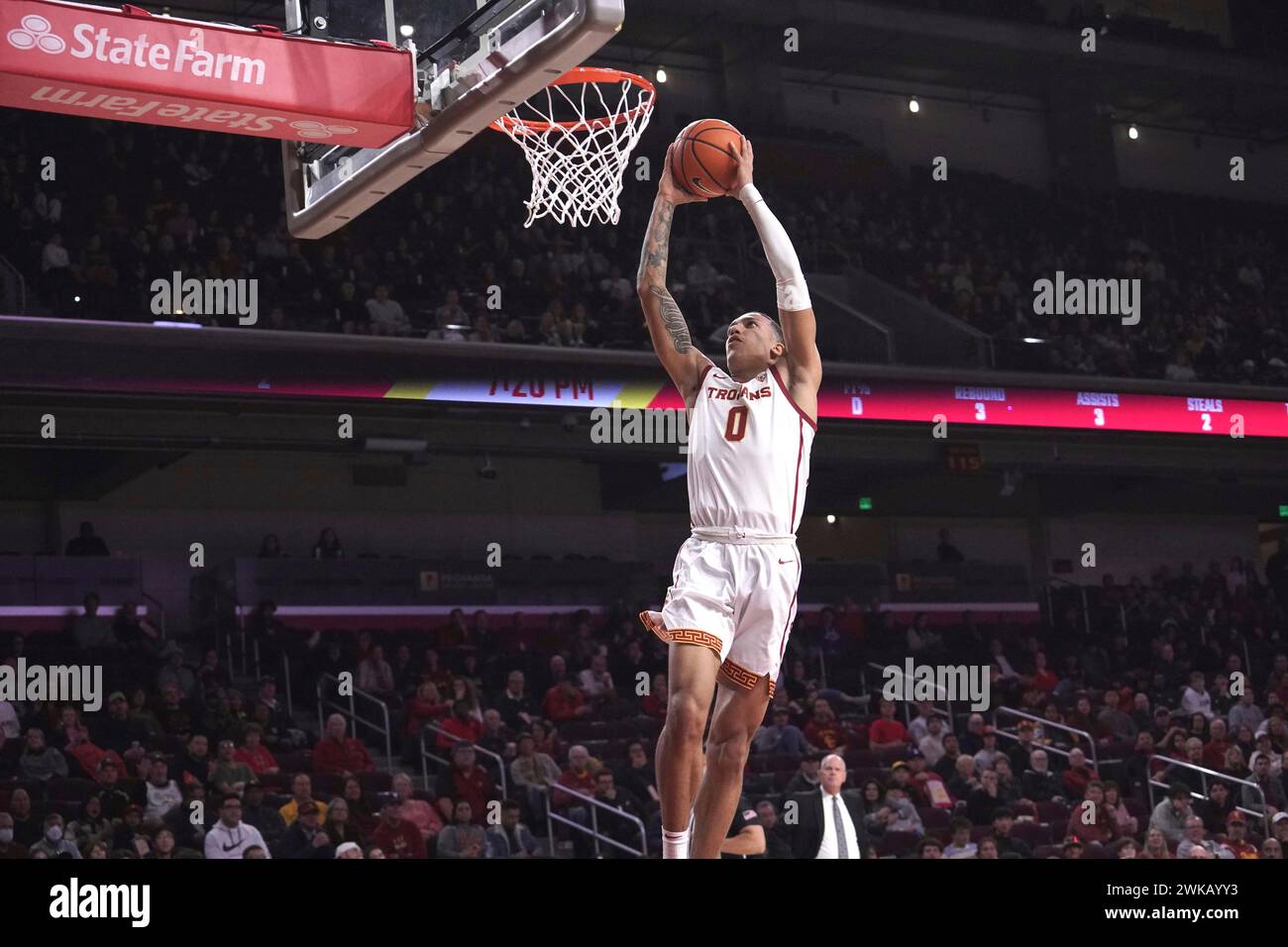 USC Trojans guard Kobe Johnson (0) makes a move with the basketball ...