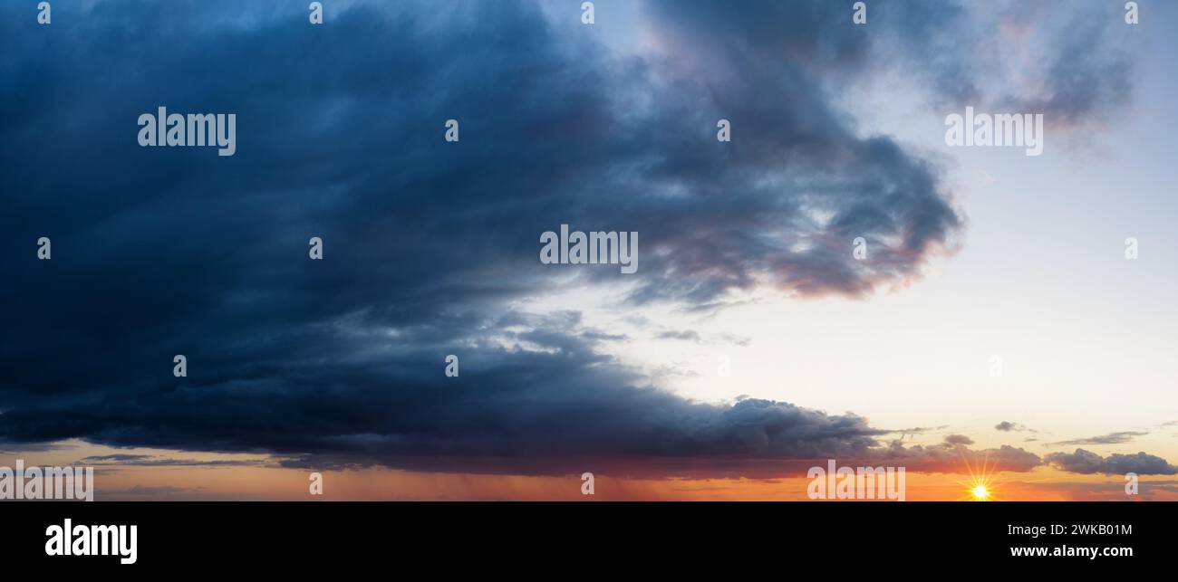 Sunset sky with dark clouds. Landscape background Stock Photo - Alamy