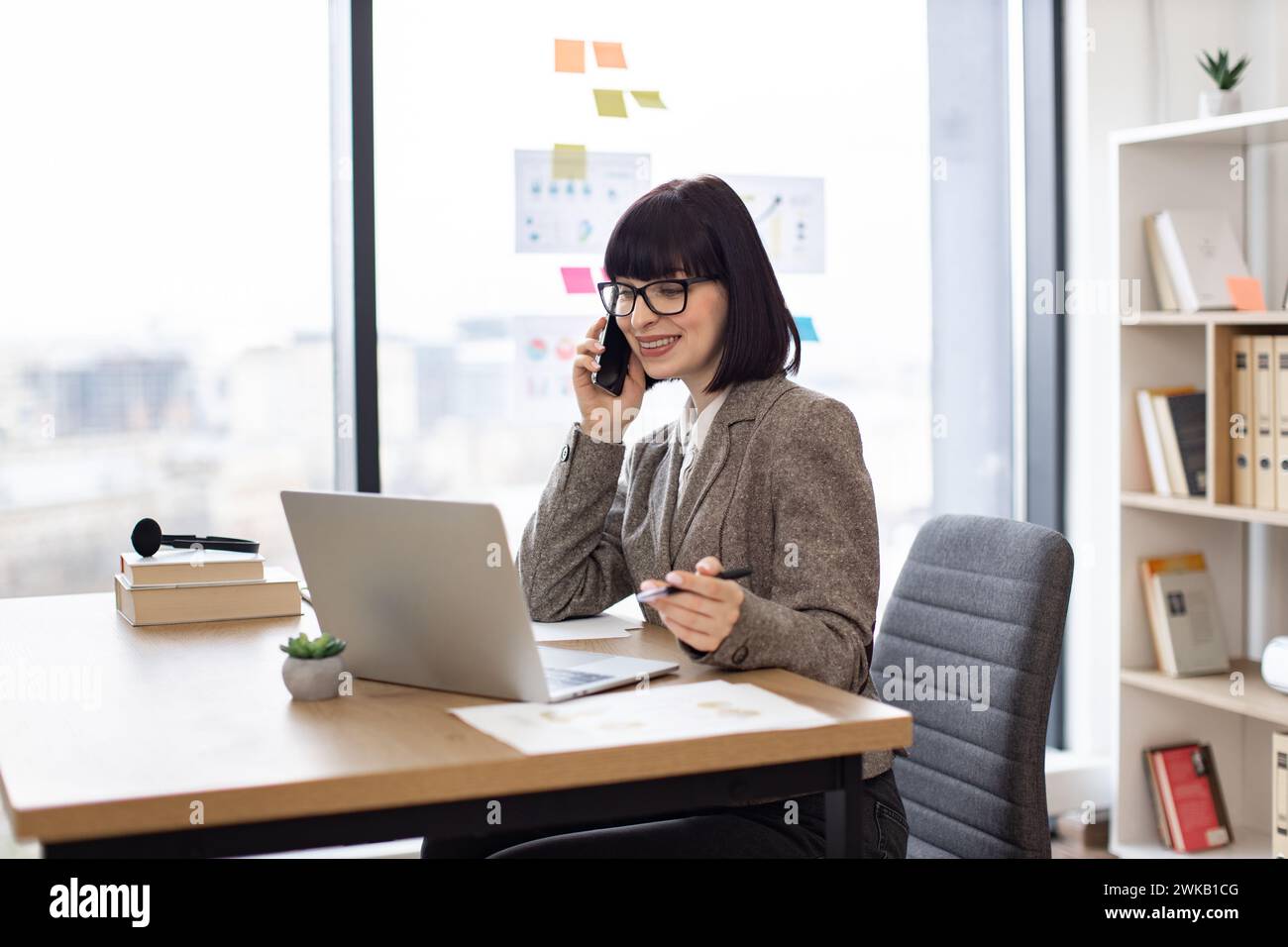 Manager sharing information during business conversation with client at ...