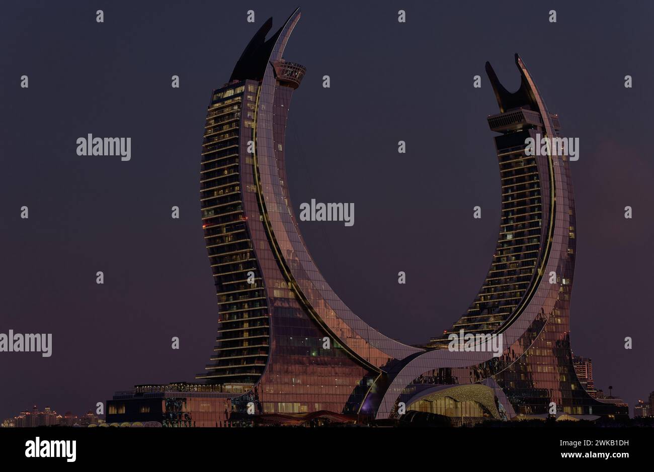 Katara Hospitality Tower, Crescent Tower, in Lusail, Qatar at dusk ...