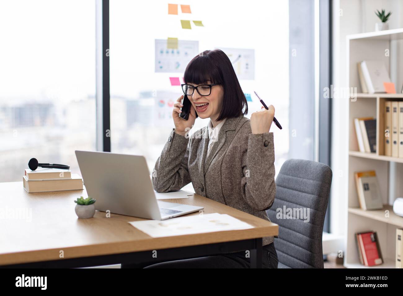 Manager sharing information during business conversation with client at ...