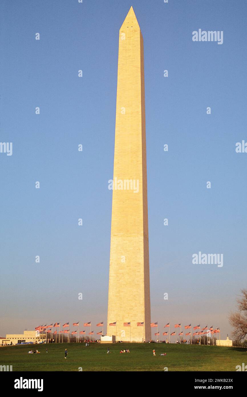 Washington Monument in Washington DC, USA and Circle of American Flags ...
