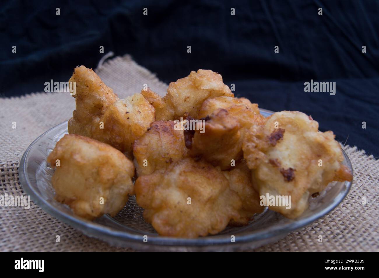 tofu with a layer of flour that is fried crispy. food photos with a ...