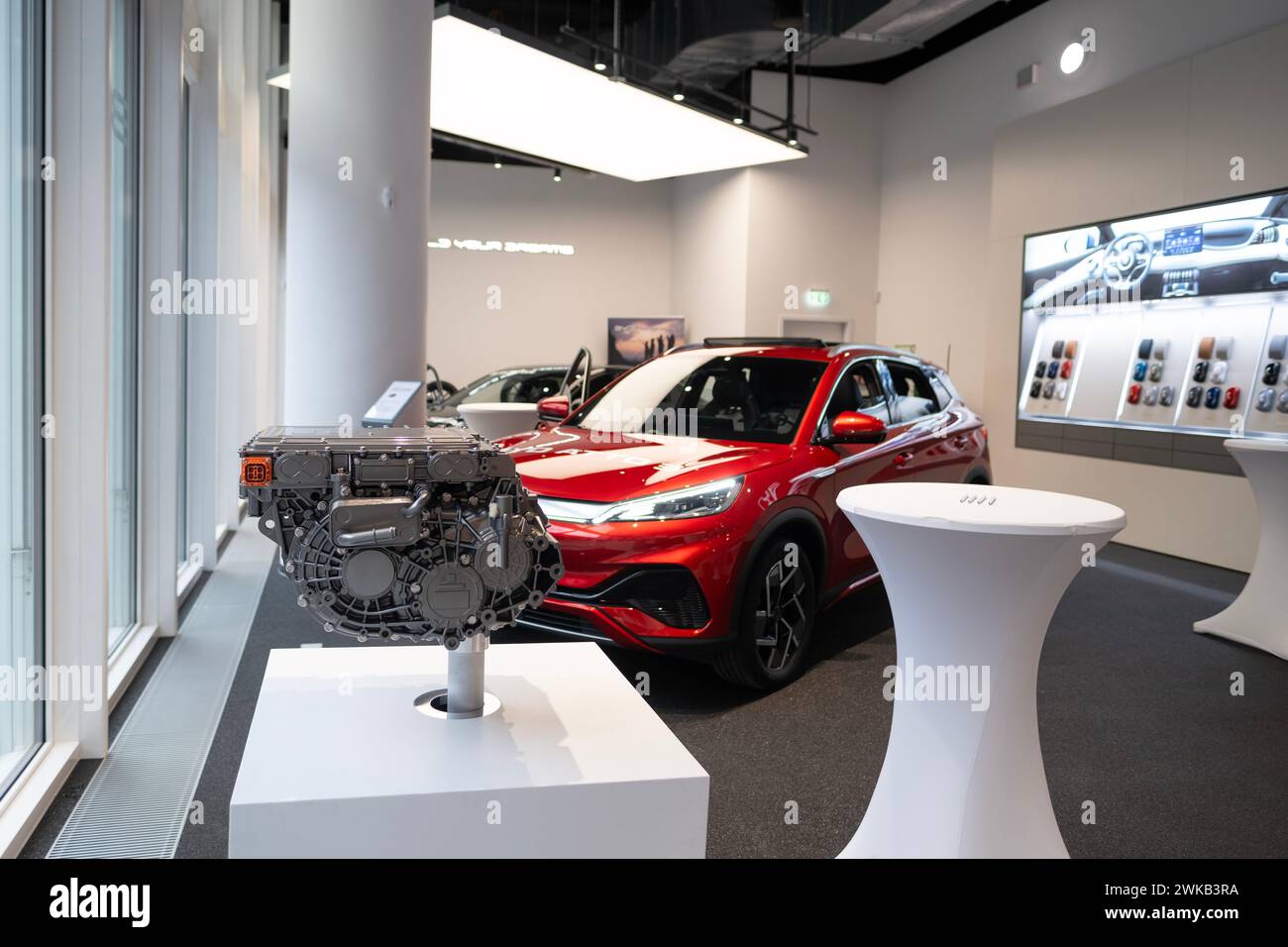 innovative electric motor BYD Electric against background of red BYD ...
