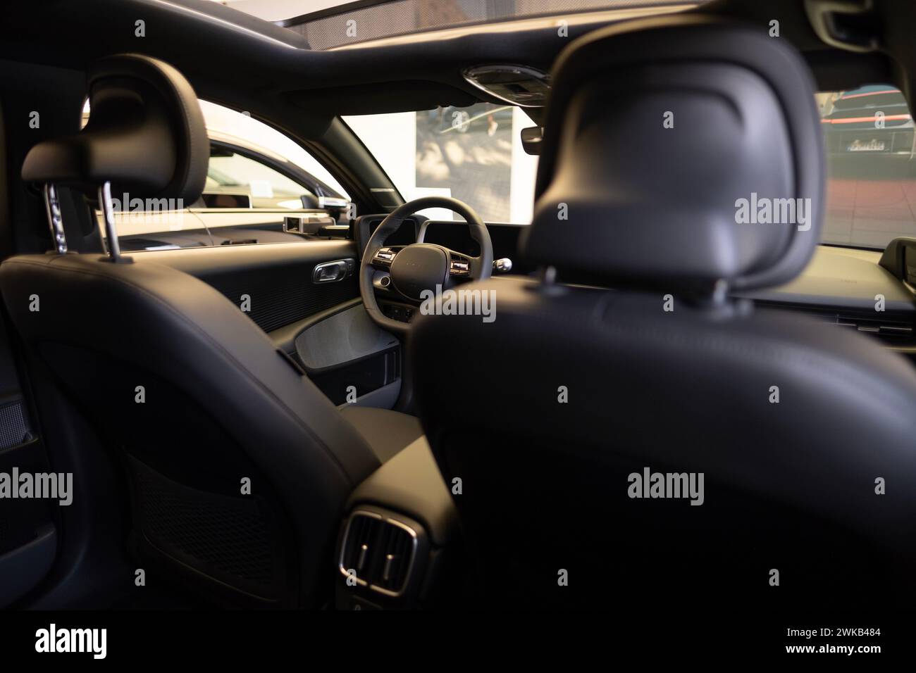 Interior, cockpit of electric streamliner Hyundai IONIQ 6 car, digital ...