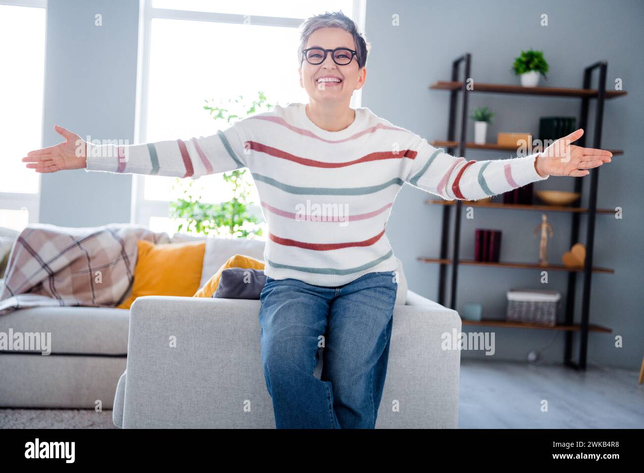 Photo of friendly cheerful lady wear striped pullover spectacles open ...