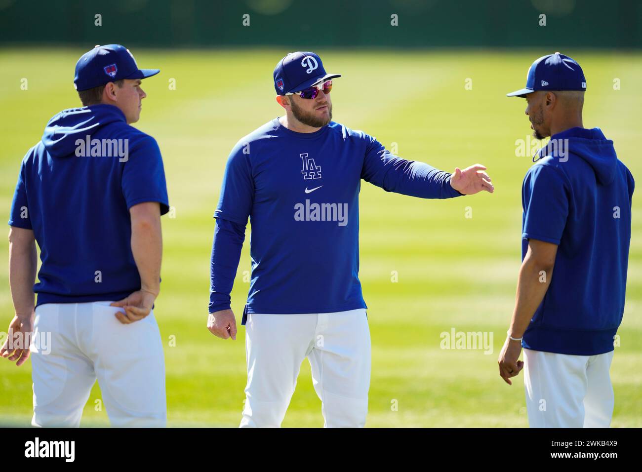 Los Angeles Dodgers catcher Will Smith, left, third baseman Max Muncy ...
