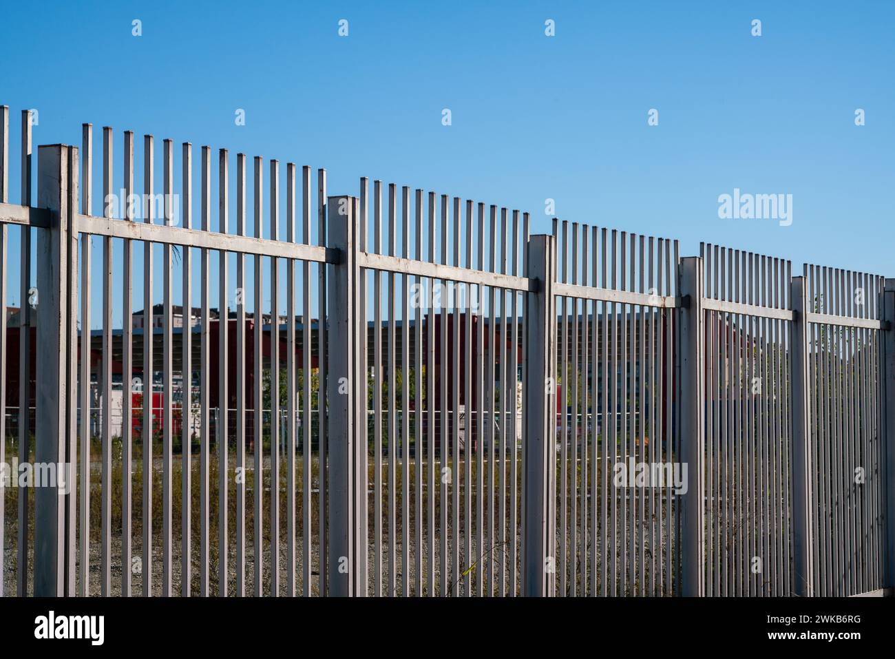 Borders, fence with steel metal grid. Detail of the grill is made with ...